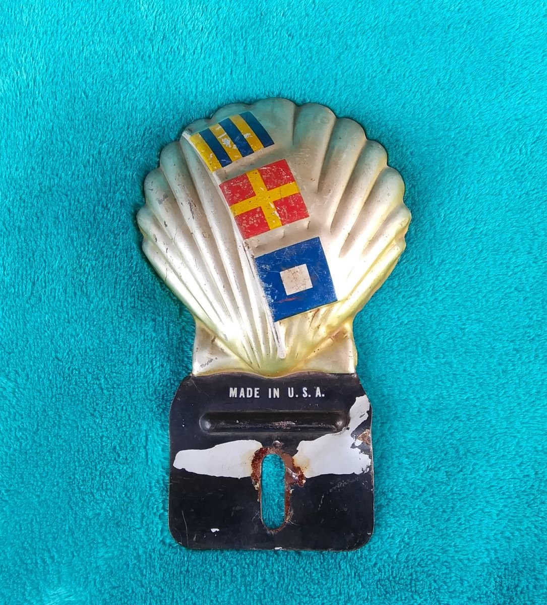 The Story Behind the Shell Oil License Plate Topper – American Car ...